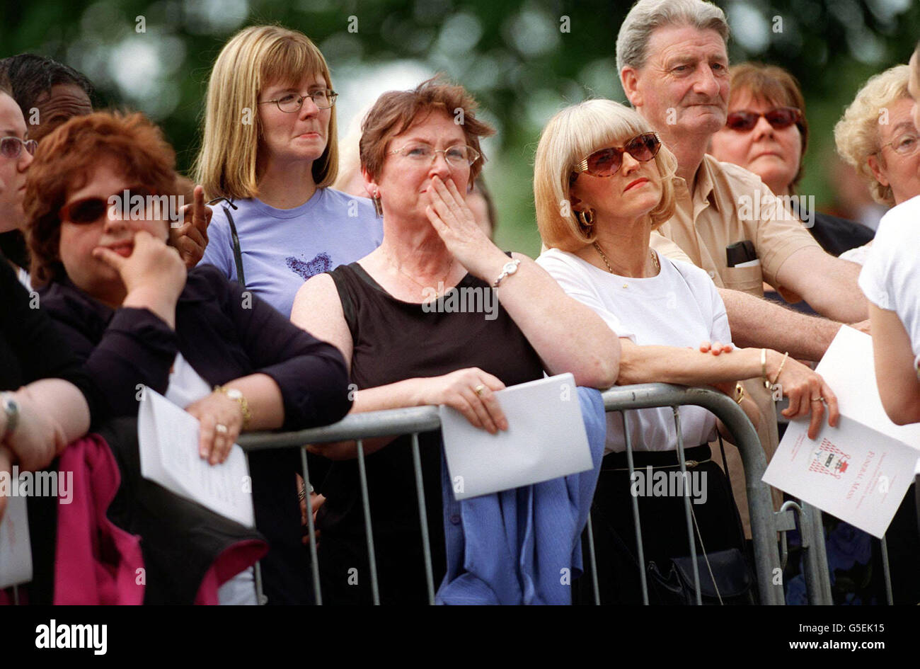Members of the public during the funeral of Cardinal Thomas Winning ...