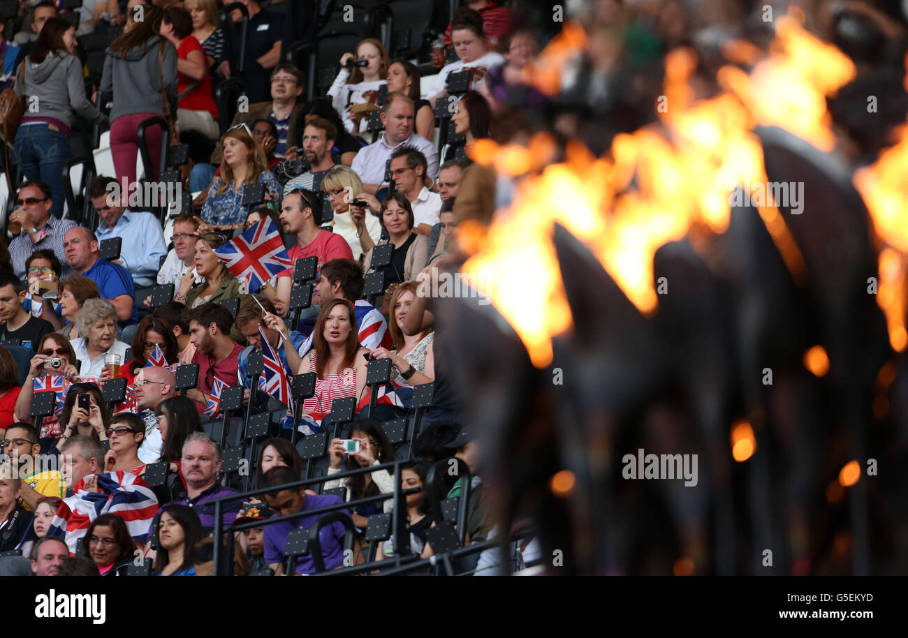 Fans in the stands watch the action at the Olympic Stadium, London ...