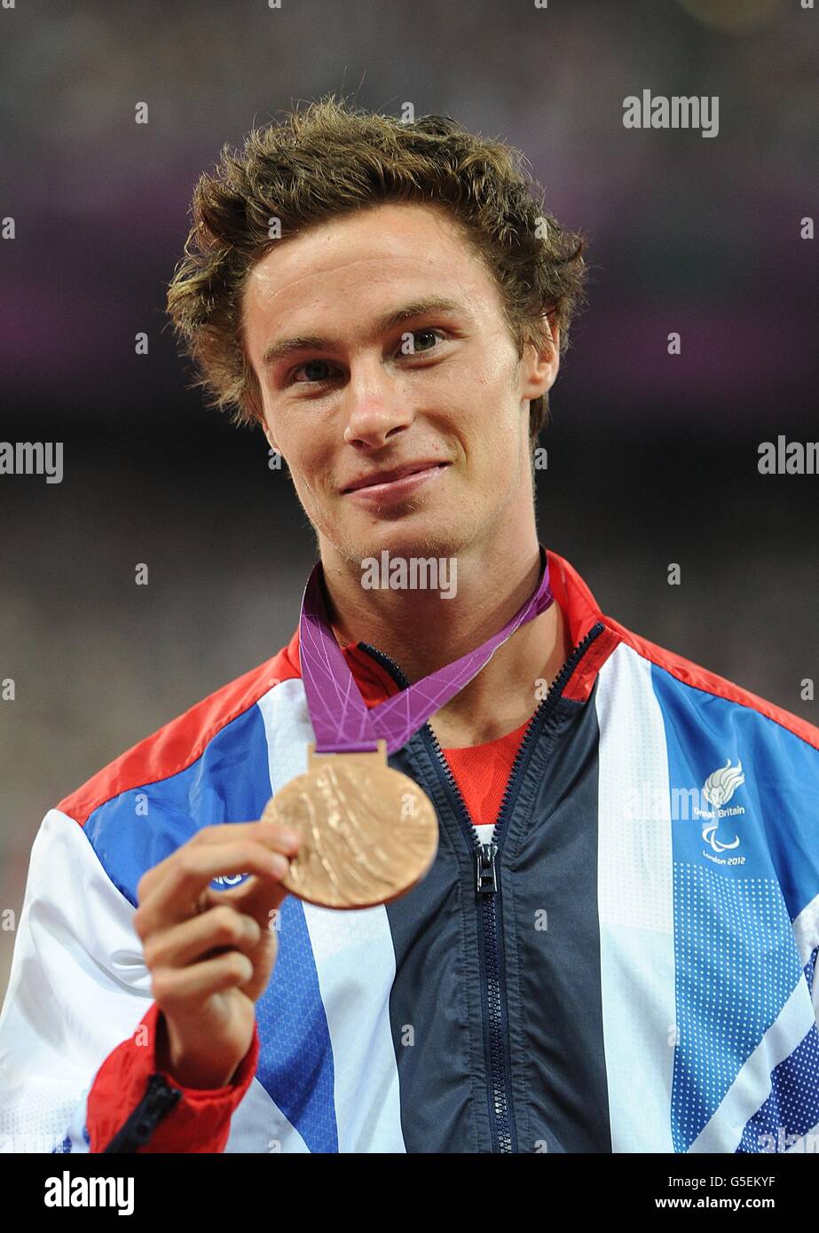 Great Britain's Paul Blake celebrates with his bronze medal after ...