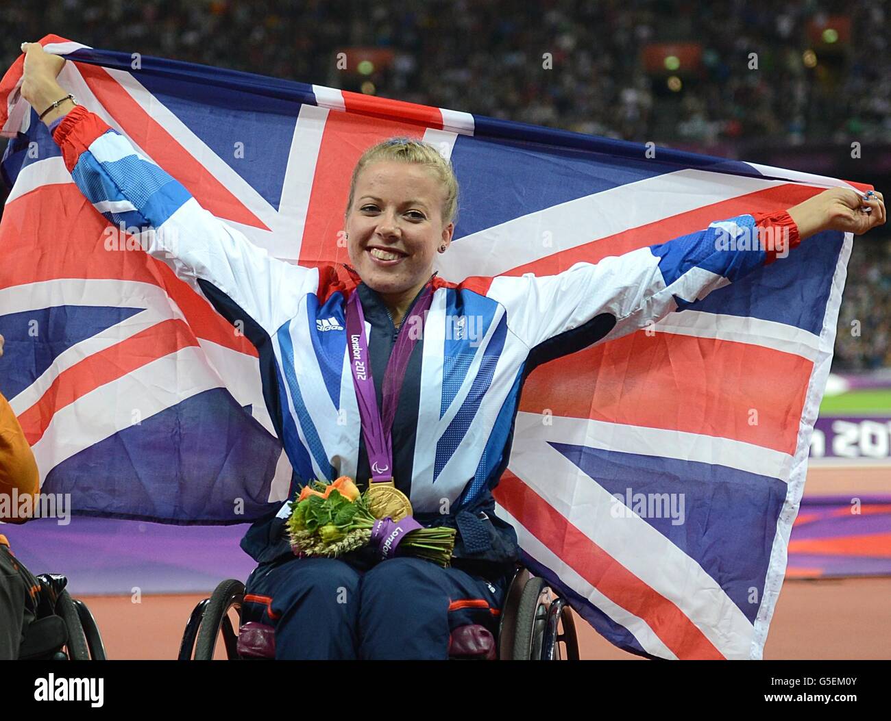 Great Britain's Hannah Cockroft celebrates with her Gold medal after ...