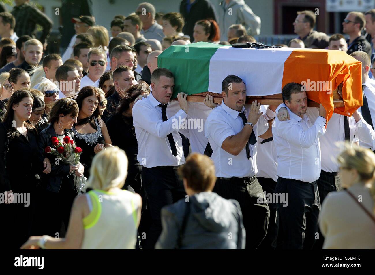 Mourners attend the funeral of Real IRA member Alan Ryan at the Church ...