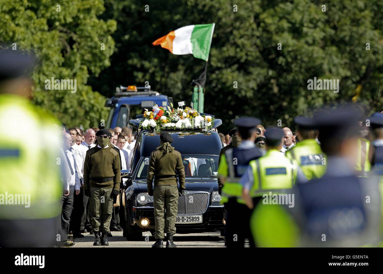 Mourners attend the funeral of Real IRA member Alan Ryan at the Church ...