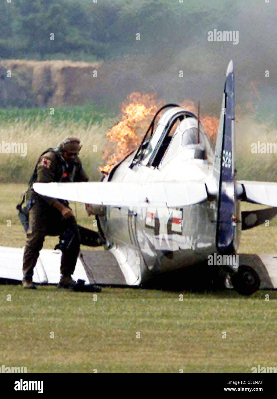 A two seater Harvard T6 plane Crashes as it takes off at RAF Duxford ...