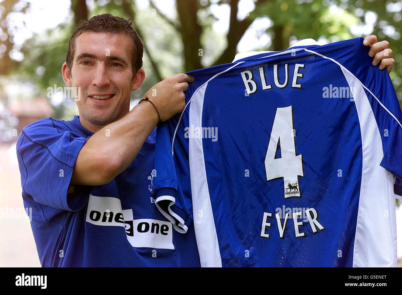 Everton's new signing Alan Stubbs poses for photographers after joining ...