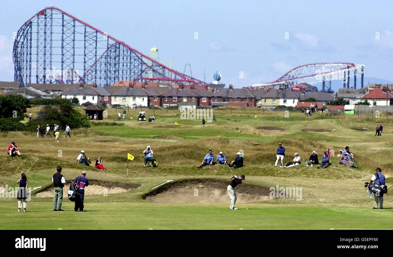 Golfers in action against the backdrop of Blackpool Pleasure Beach ...