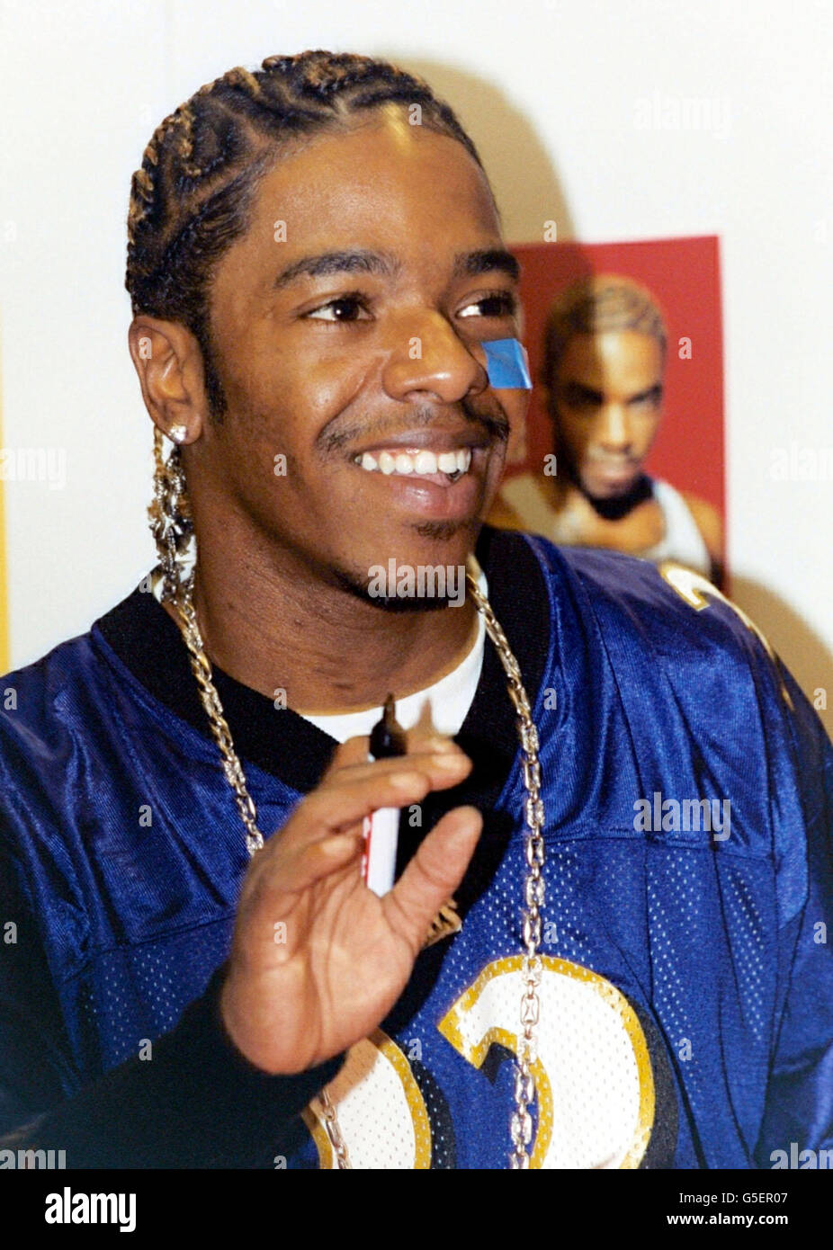 Pop singer plaster jewellery chain plaited hair marker celebrity hi-res ...