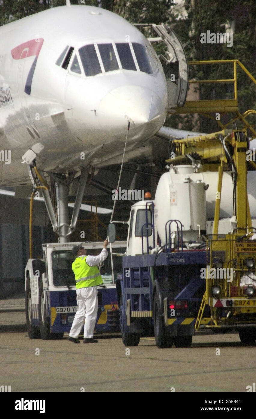 A ground engineer cleans the front of Concorde at the British Airways ...