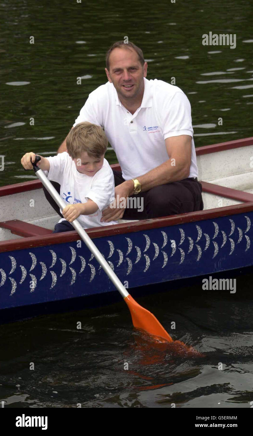 Sir Steve Redgrave and son Zac aged 3 rowing a dragon boat on the River ...