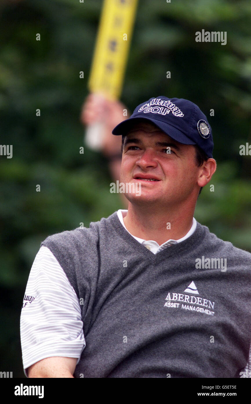 Scotland's Paul Lawrie watches his drive down the second fairway during ...