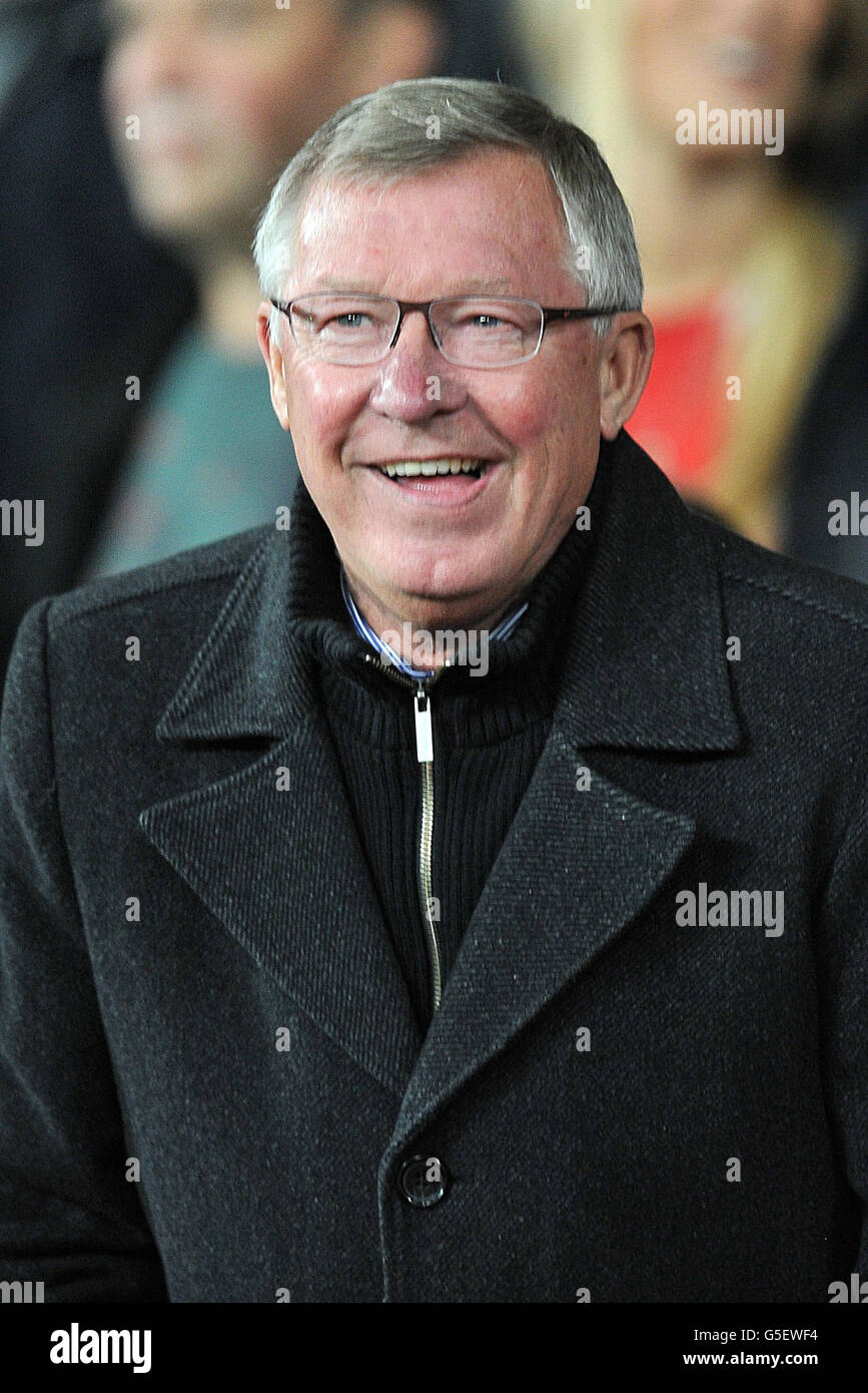 Manchester United manager Sir Alex Ferguson smiles before the UEFA ...