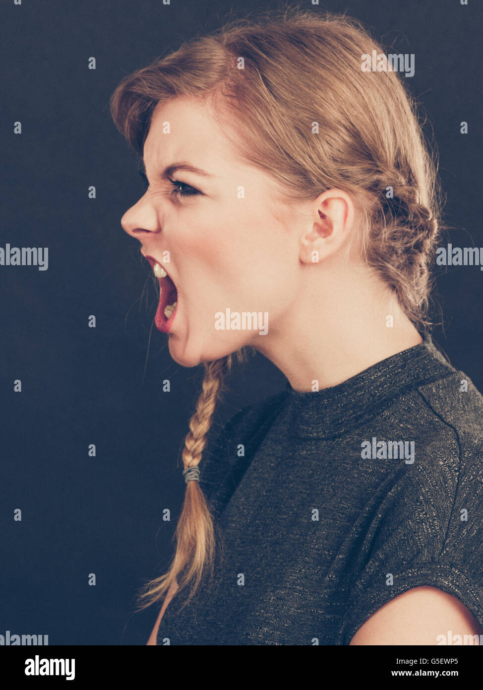 Facial emotions expression. Young blonde expressive angry furious ...
