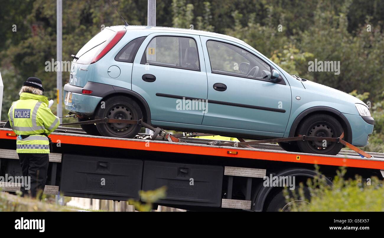 A car is removed from the scene where Police Officers Fiona Bone and ...