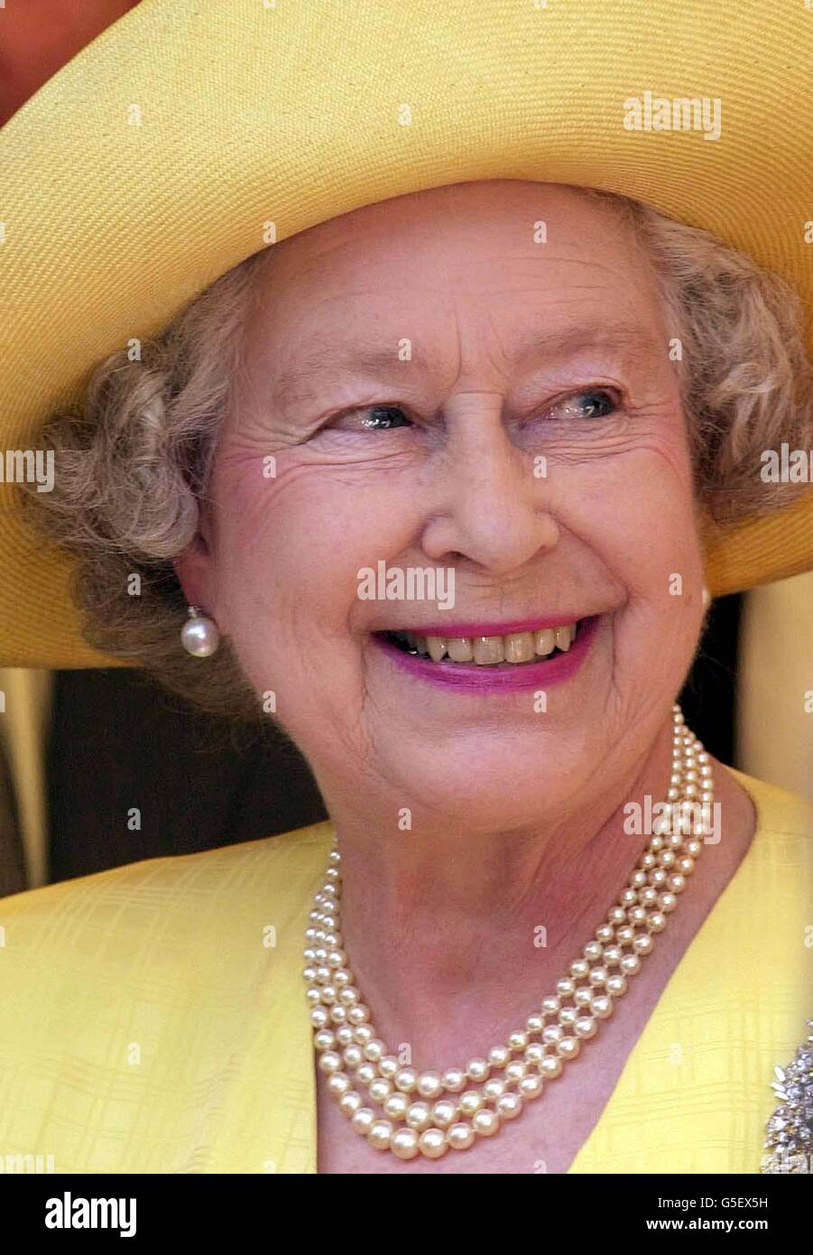 The queen smiles laying foundation stone memorial gates hi-res stock ...