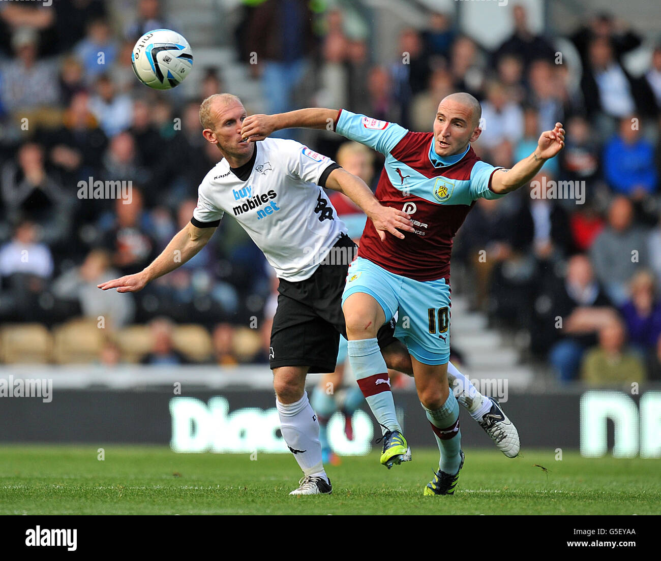 Derby County's Gareth Roberts (left) and Burnley's Martin Paterson ...