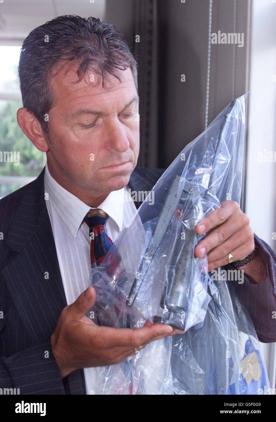 Detective Inspector Steve Turpin of Devon and Cornwall Police displays ...