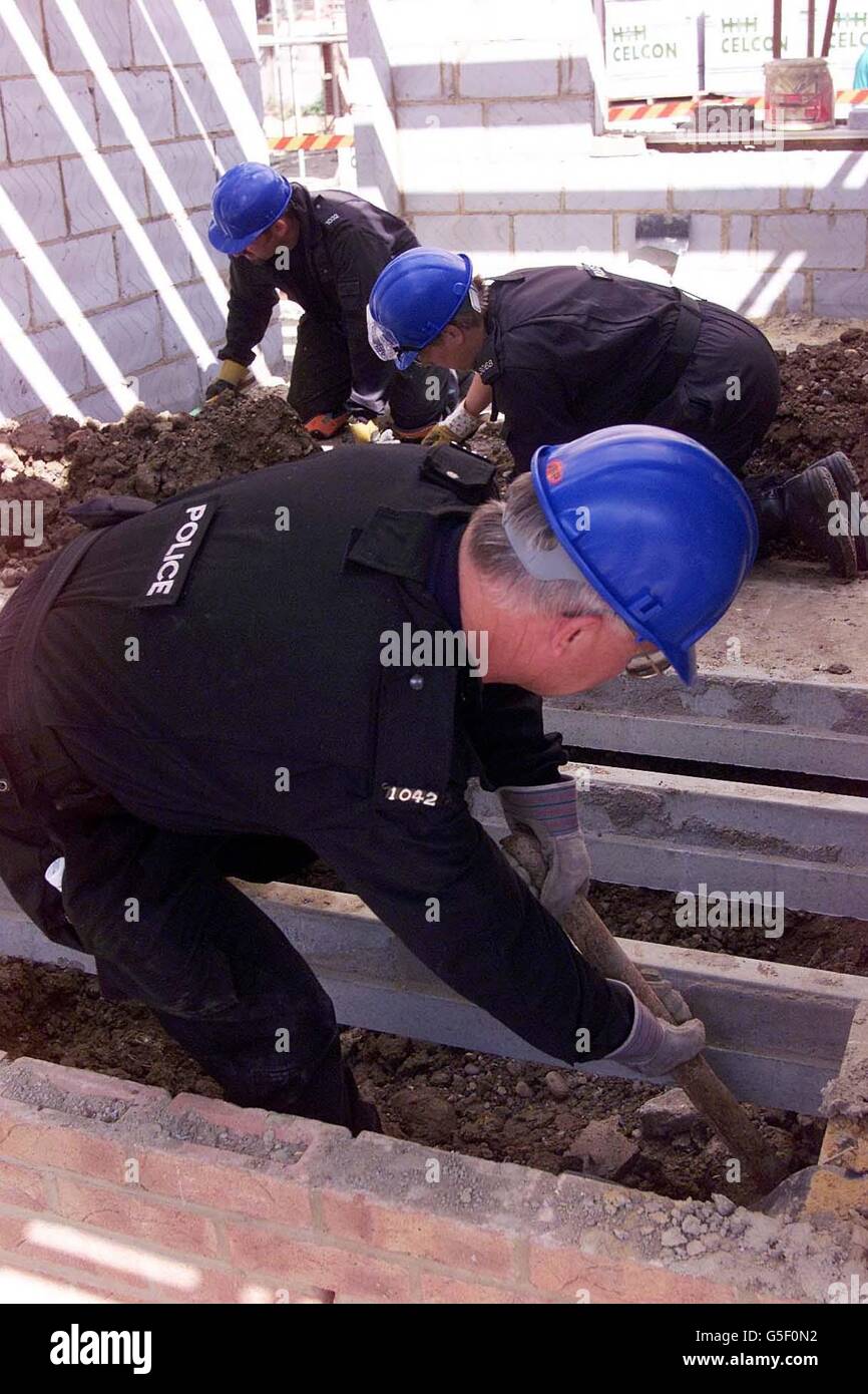 Essex Police officers searching a building site in Connaught Avenue ...
