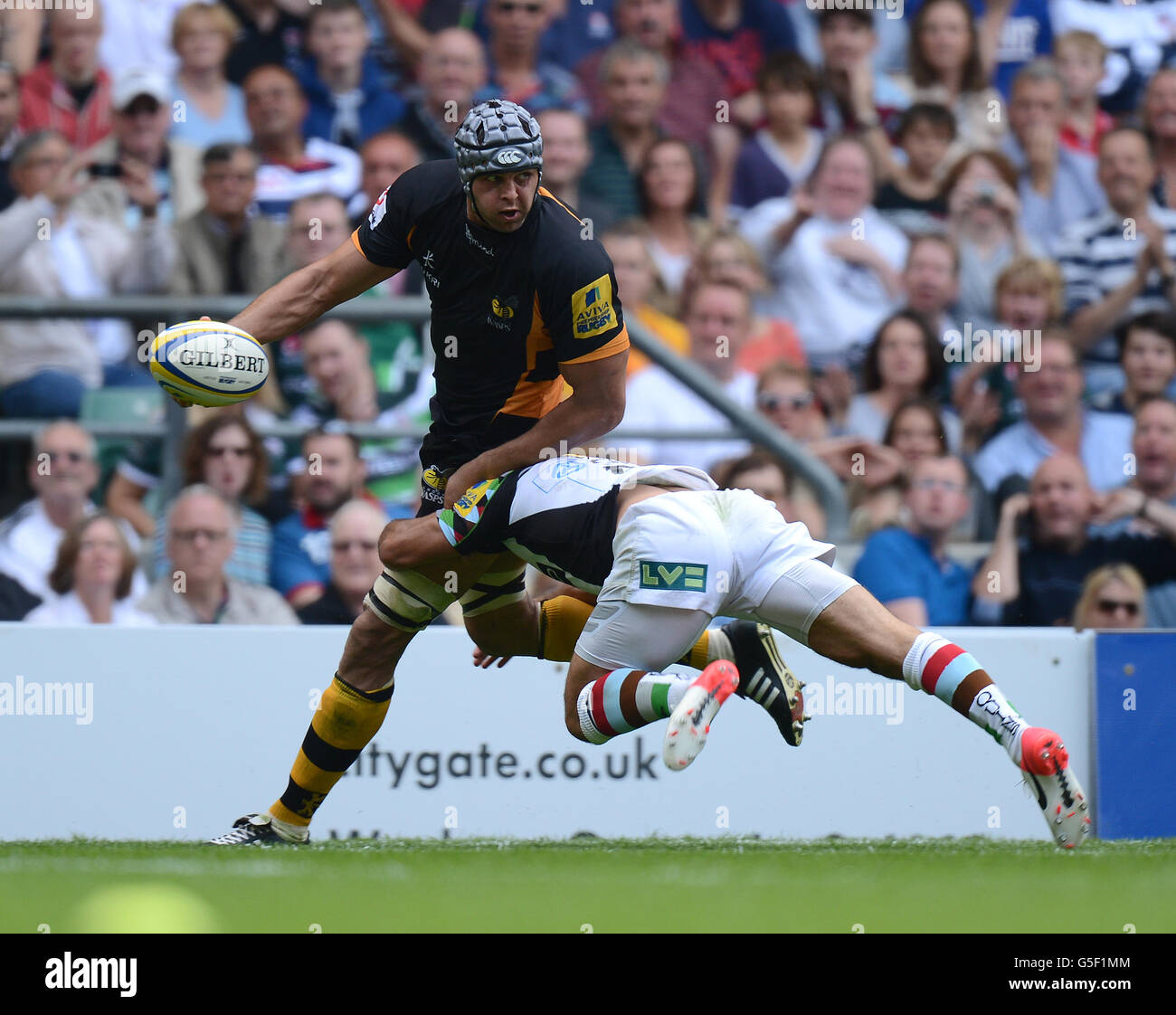 London wasps marco wentzel tackled by harlequins danny care hi-res ...