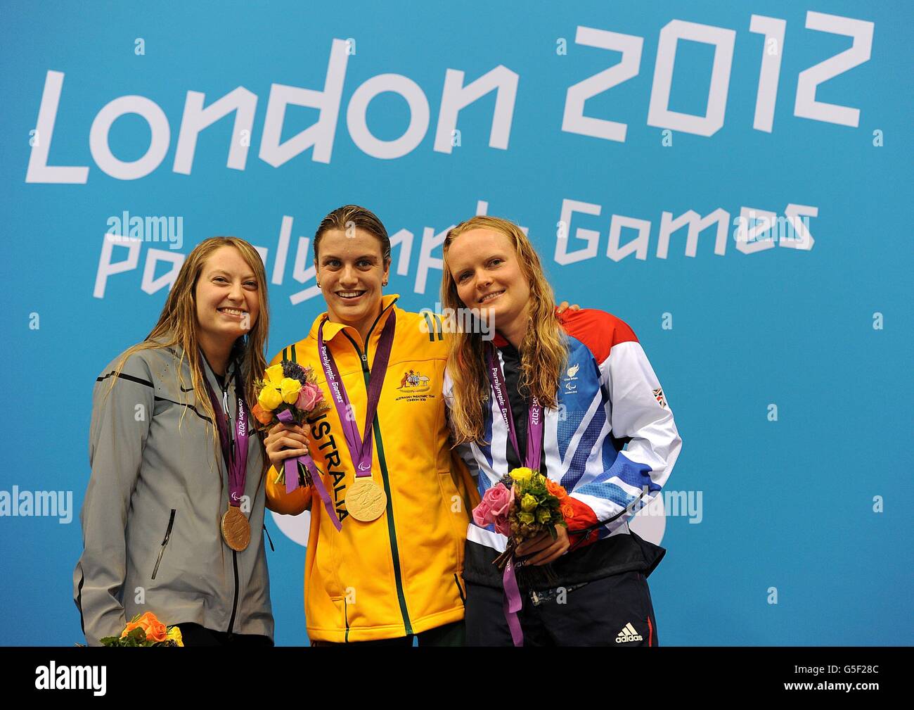 Australia's Jacqueline Freney (cente) on the podium with her gold medal ...