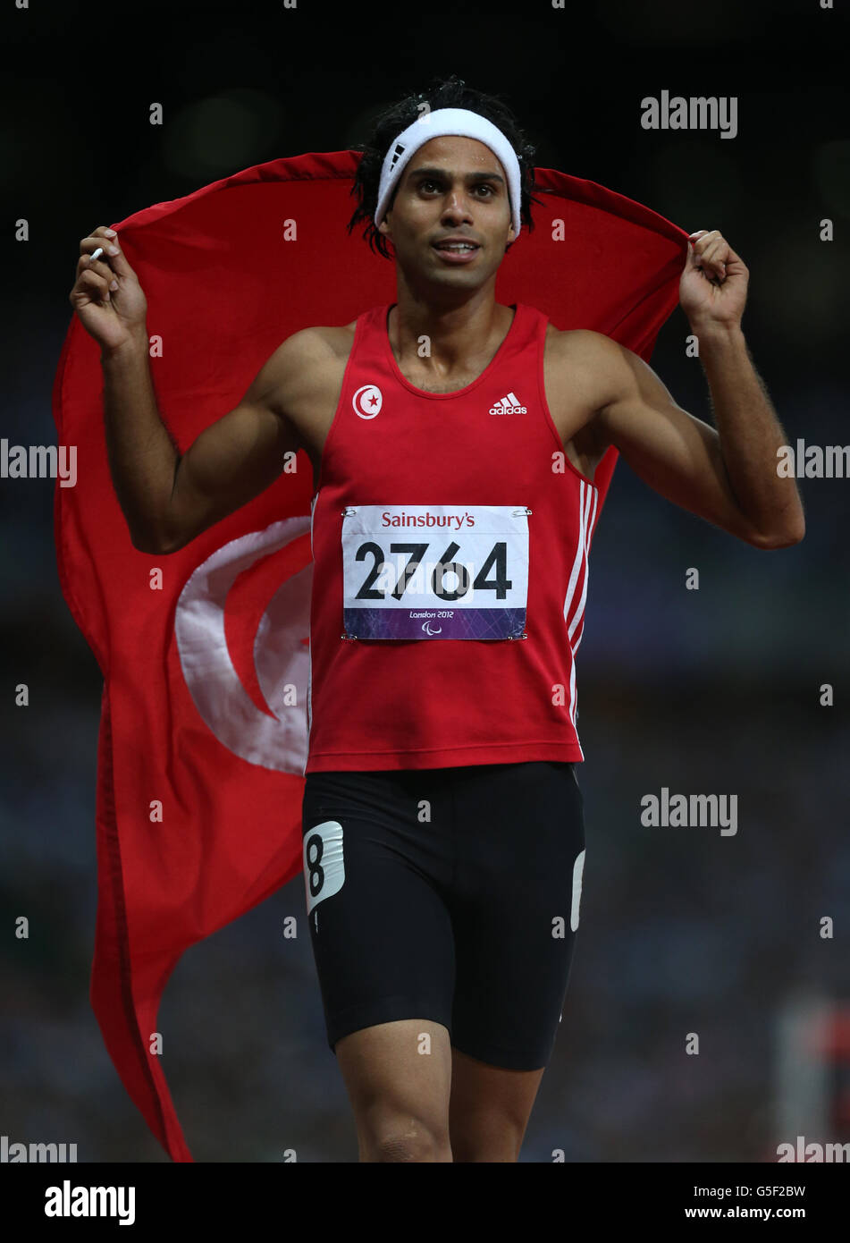 Tunisias mohamed farhat chida celebrates winning mens 400m hi-res stock ...