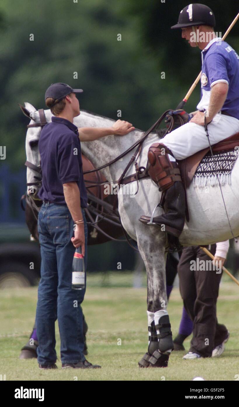 Prince William, the eldest son of the Prince of Wales (left) chats with ...