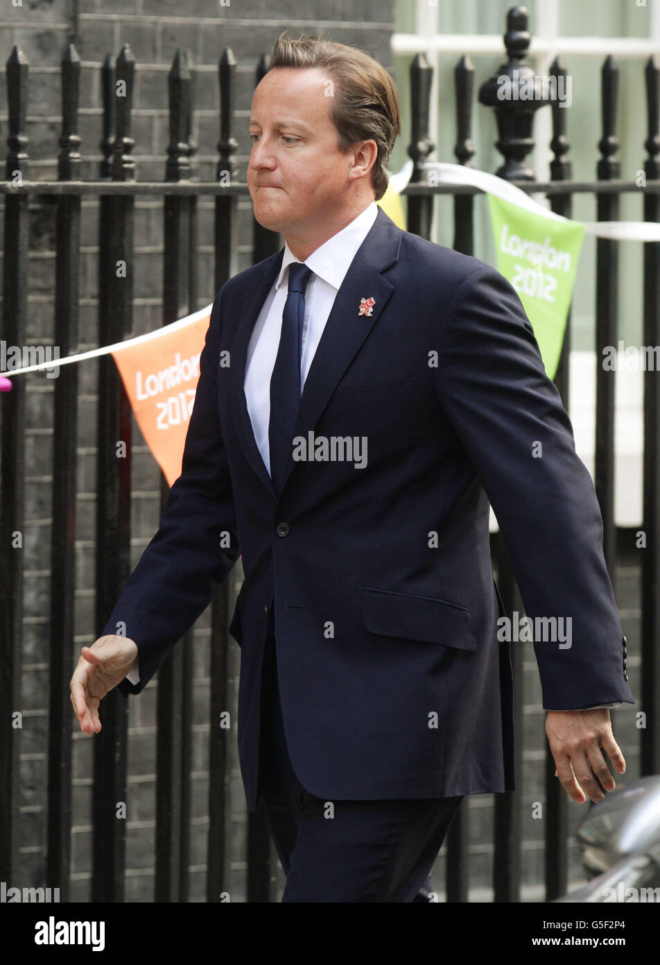Prime Minister David Cameron arriving at No 10 Downing Street in ...