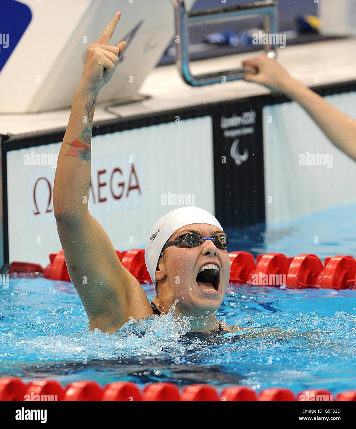 Russia's Oxana Savchenko celebrates winning the gold medal in the Women ...