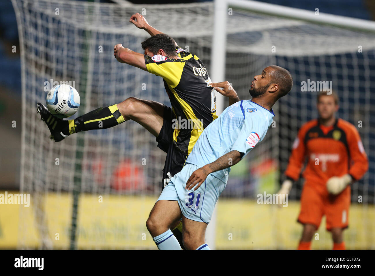 Coventry City's David McGoldrick (right) and Burton Albion's Andrew ...