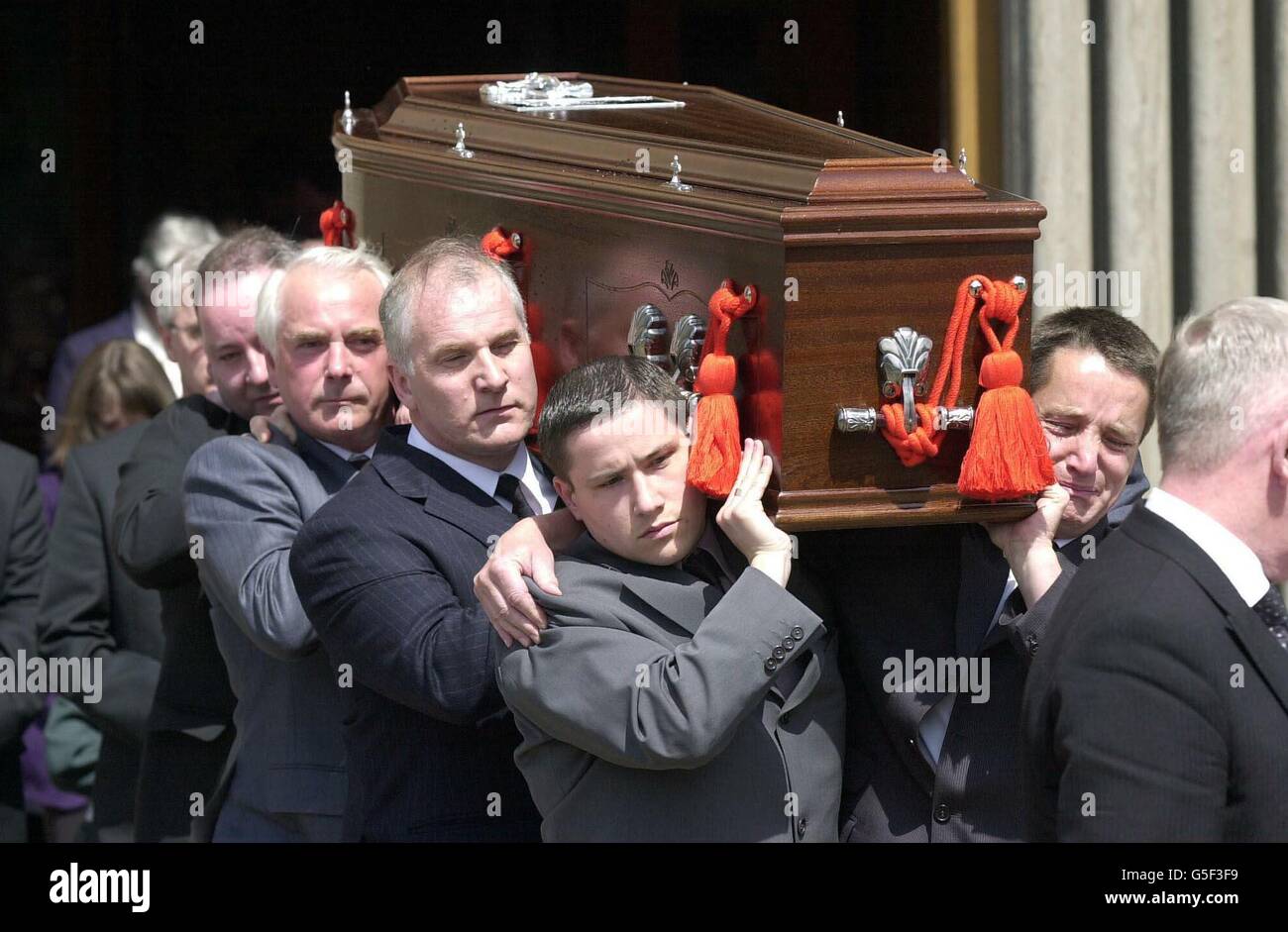 The coffin is carried out of the Catholic Cathedral in Glasgow, at the ...