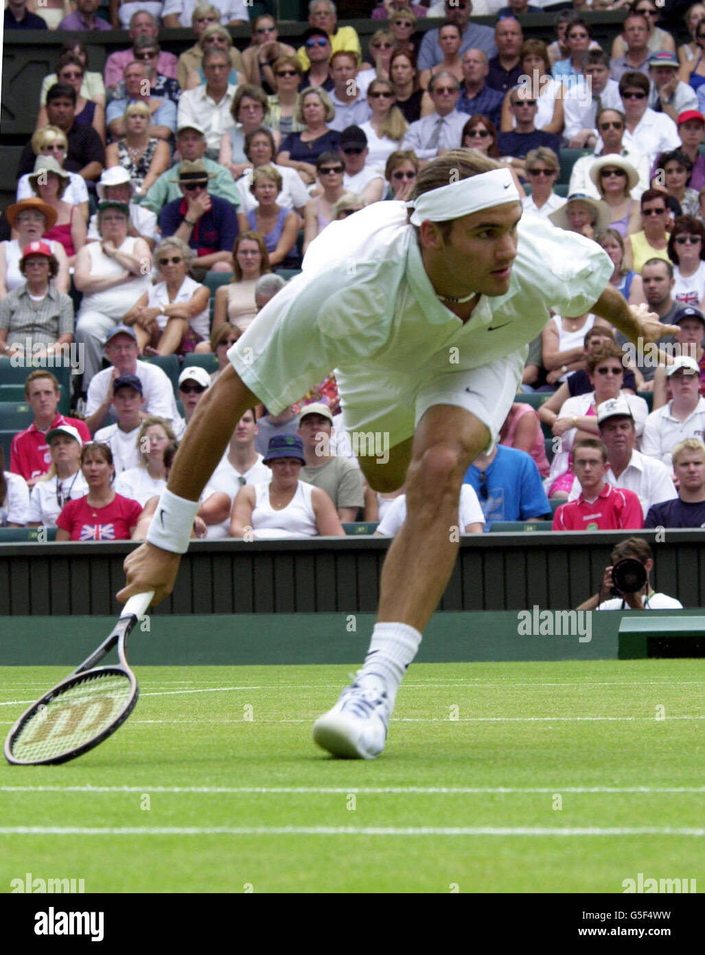 Switzerland's Roger Federer in action against USA's Pete Sampras during ...