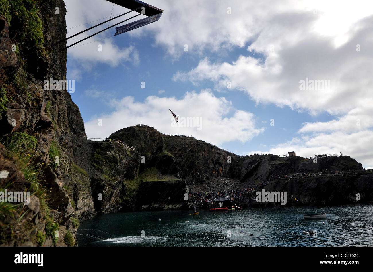 A competitor during the first day of the Red Bull Cliff Diving World ...
