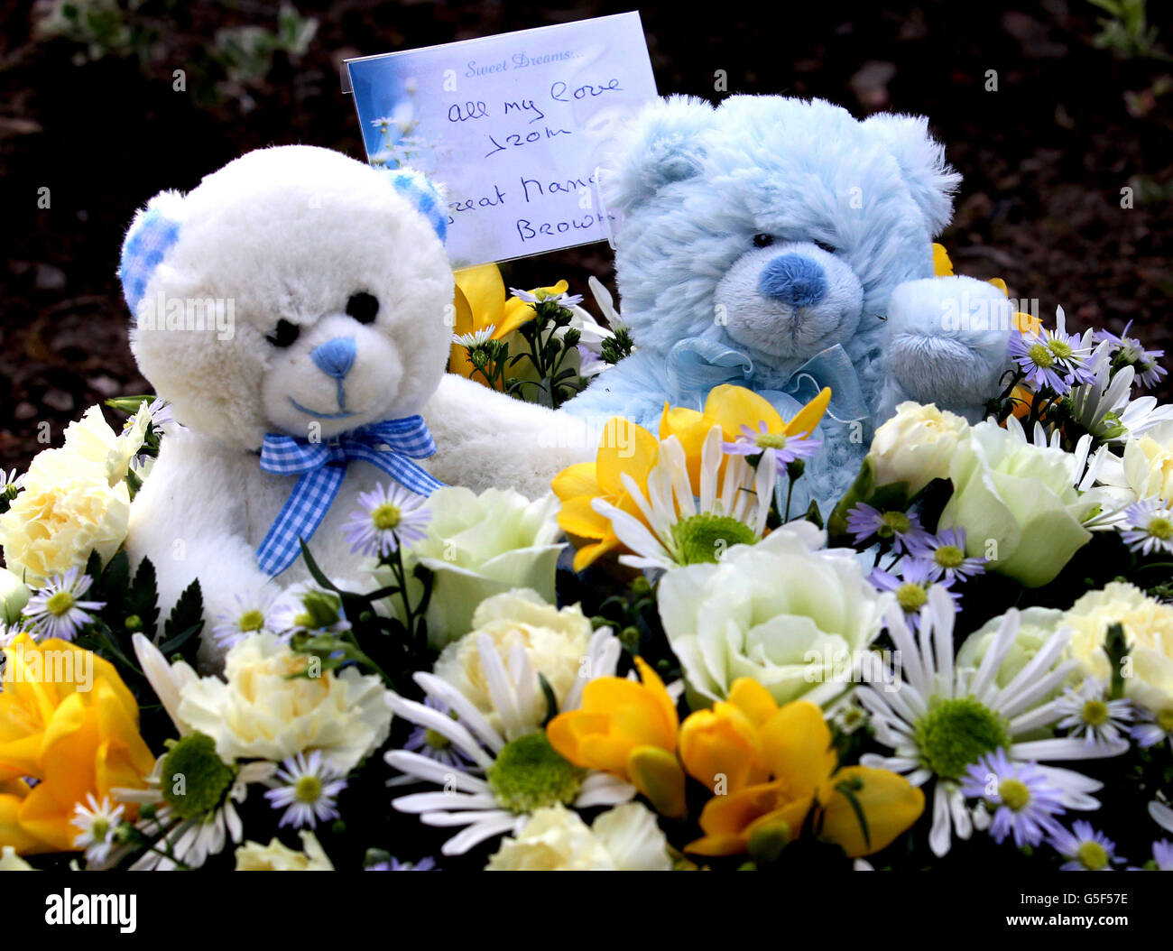 Floral tributes at the funeral of Ewen and Jamie Beaton, the two ...
