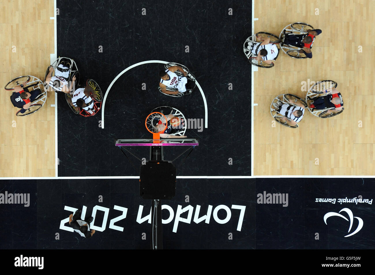 Great Britain's Peter Finbow scores a basket during the men's ...