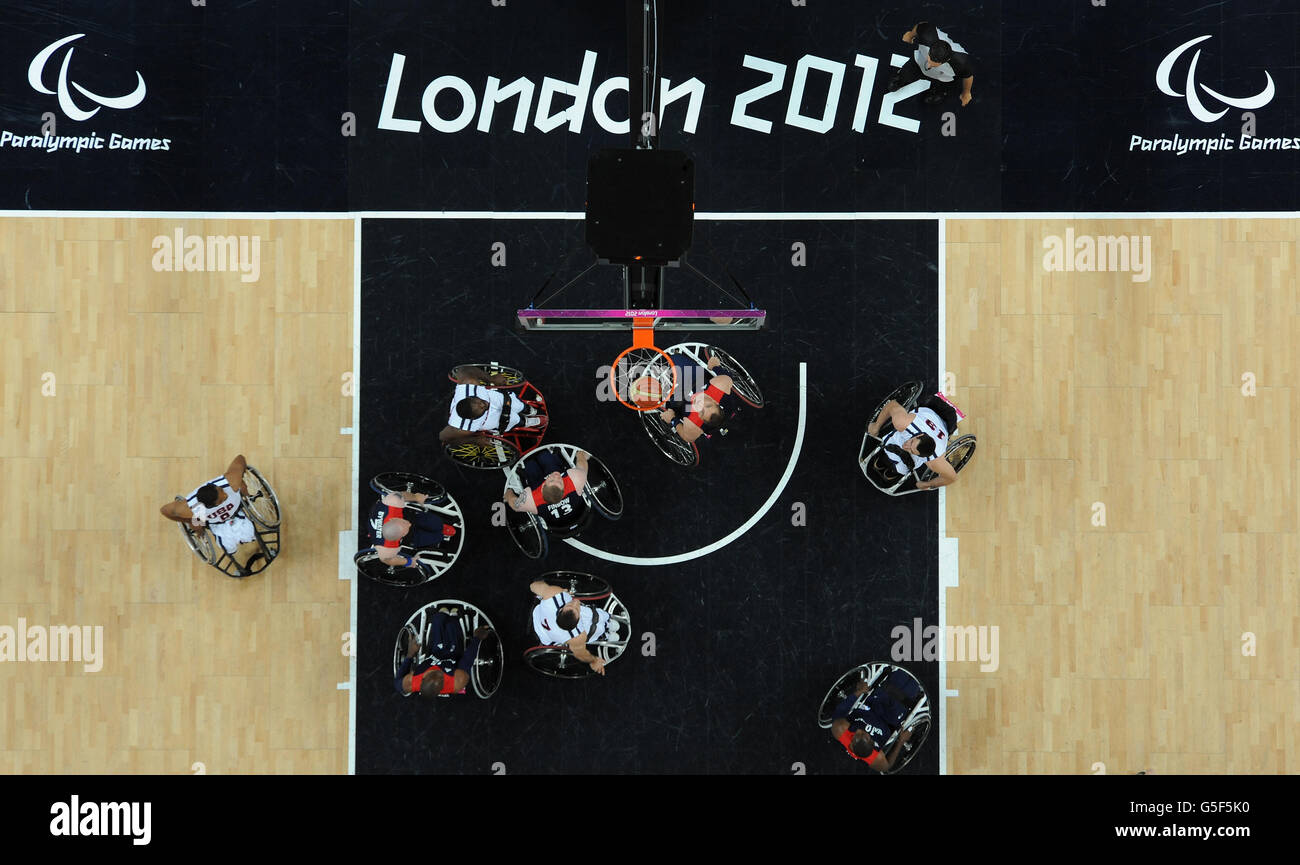 USA's Matt Scott scores a basket during the men's wheelchair basketball ...
