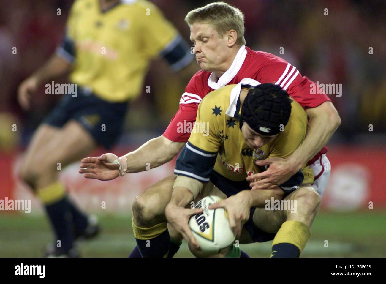 British and Irish Lions player Iain Balshaw tackles Australia's Stephen ...