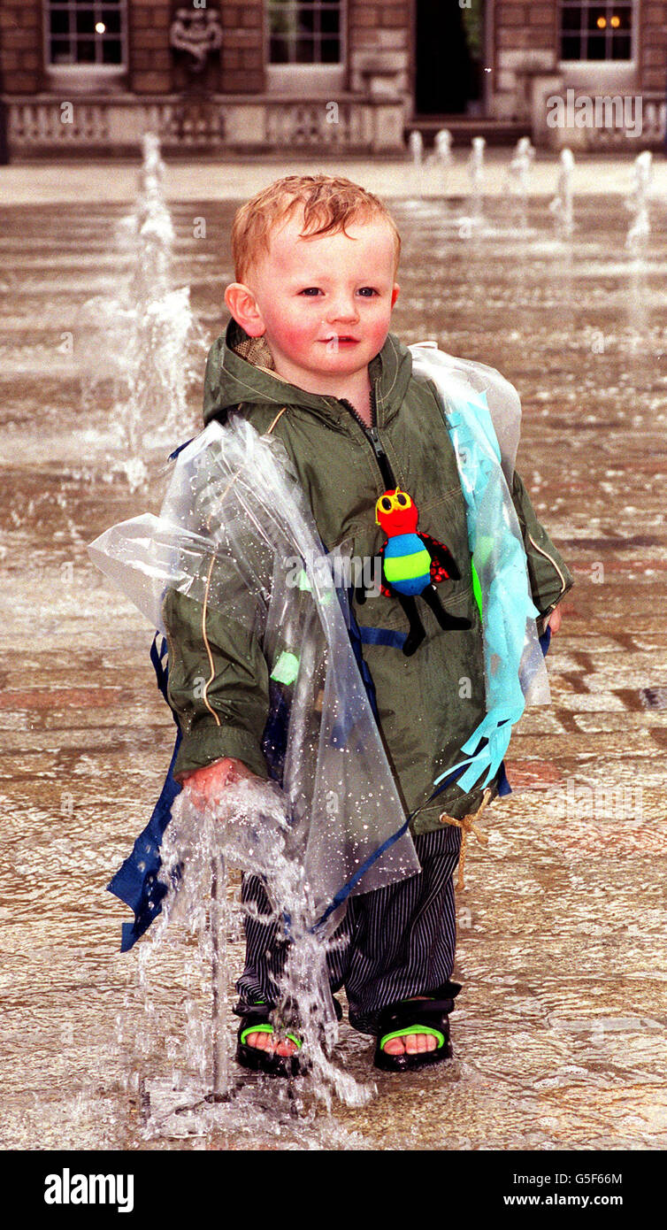 Sebastian Fisher, 2, from London plays in the fountains in the ...