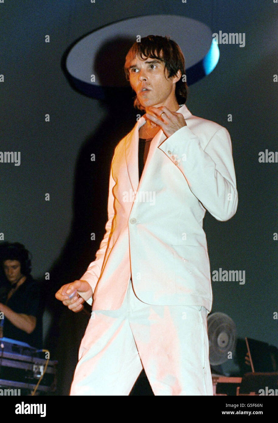 White suit singing celebrity music musg hi-res stock photography and ...