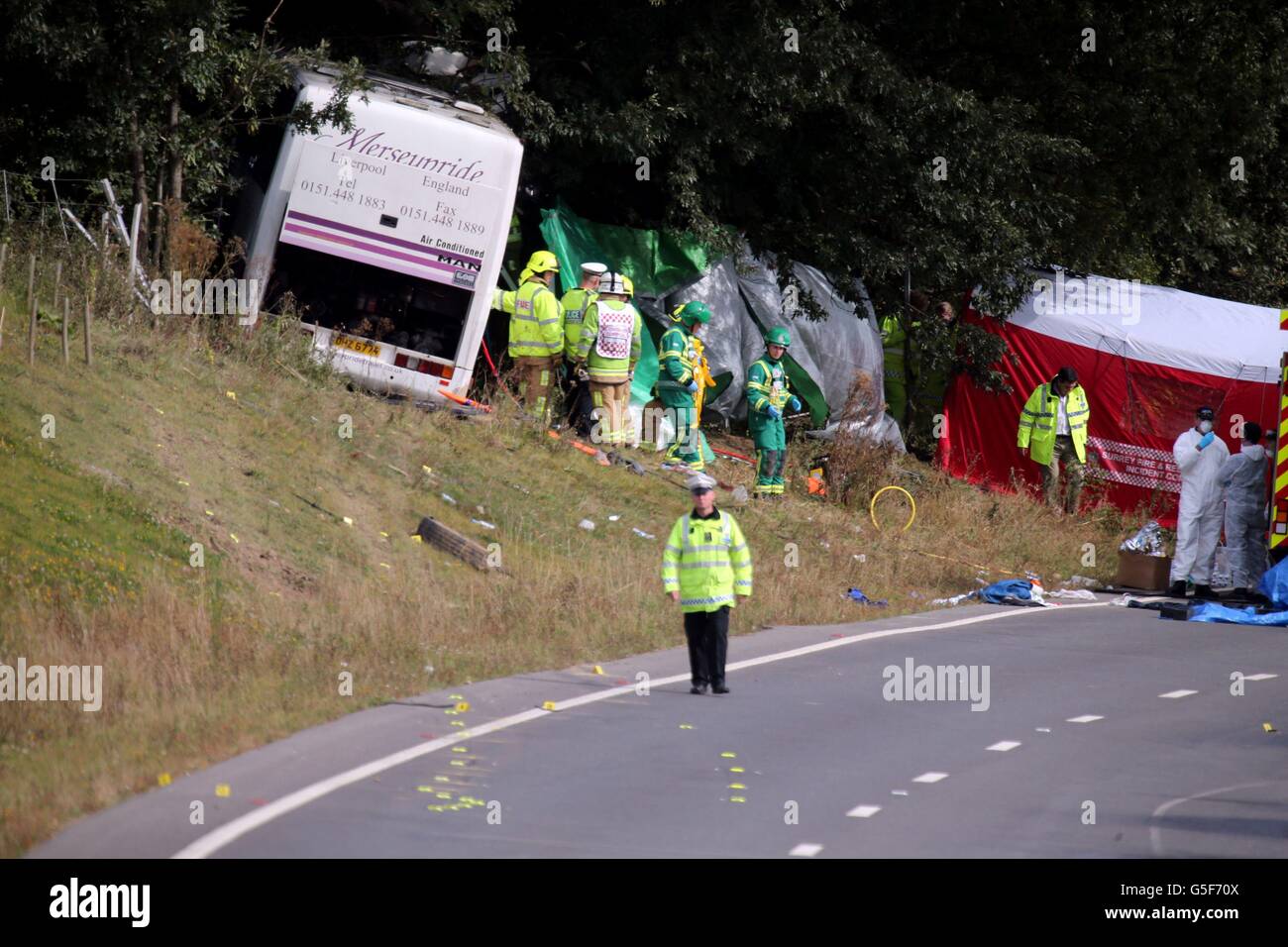 Emergency services at the scene of a coach crash on the A3 near ...