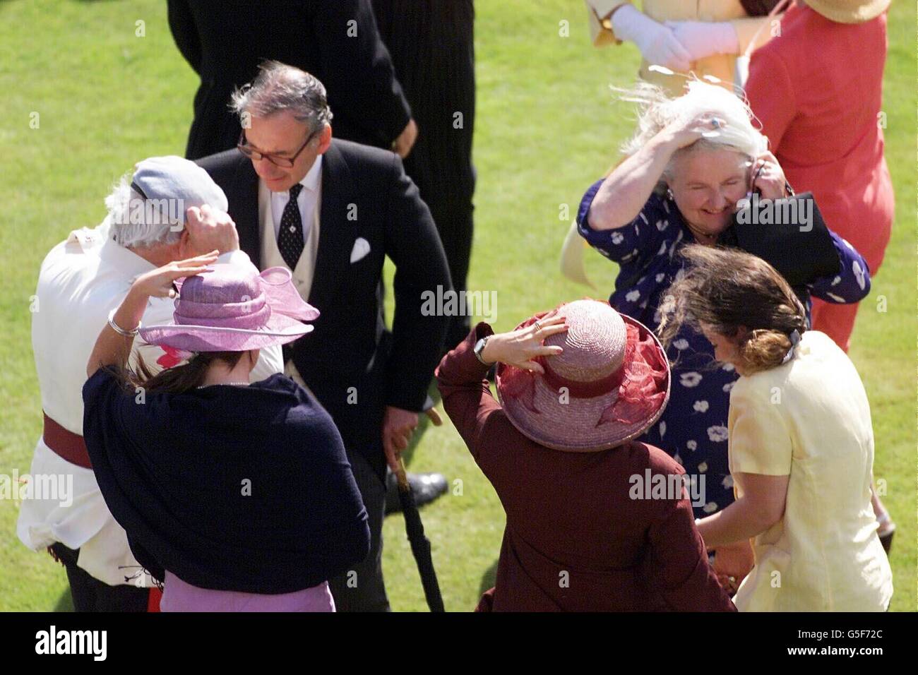 Alan weller the times rota windy holding hats royal hi-res stock ...