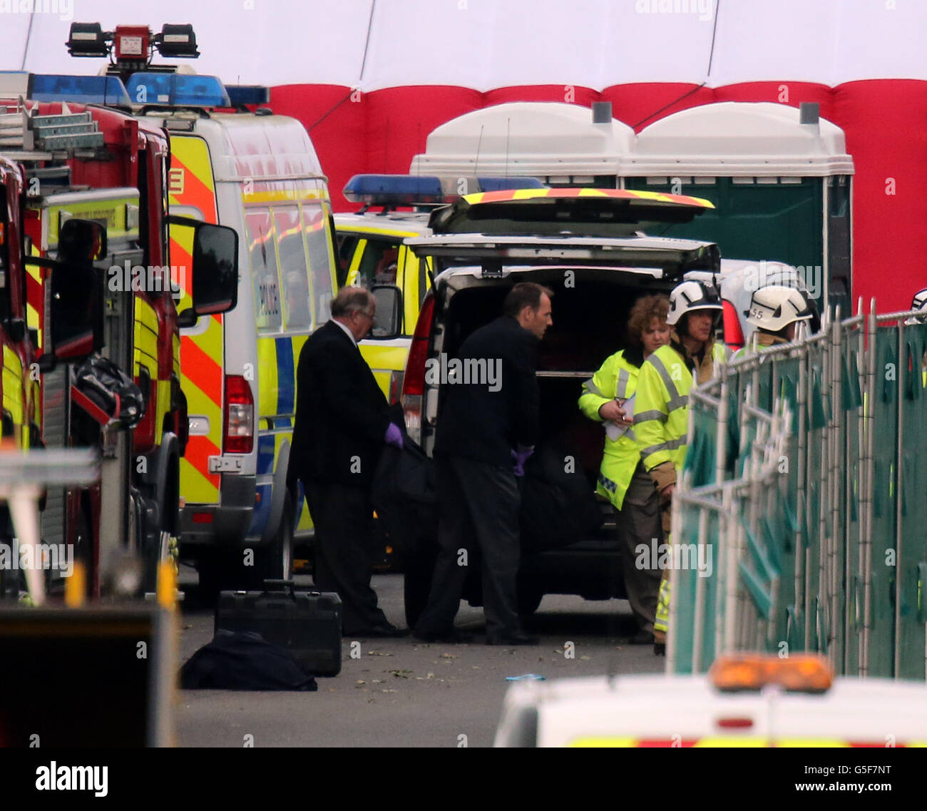 The emergency services remove bodies at the scene of a coach crash on ...