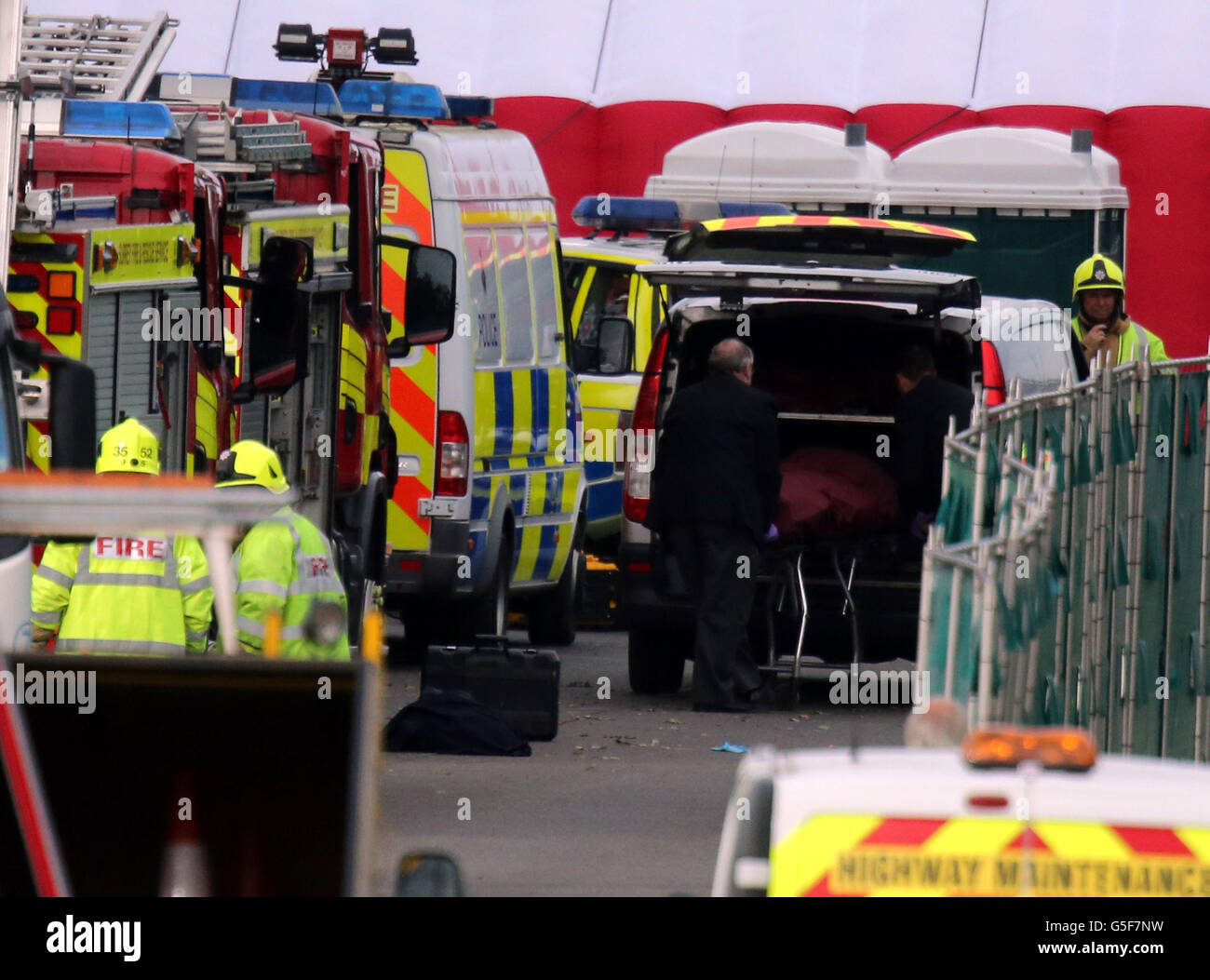The emergency services remove bodies at the scene of a coach crash on ...