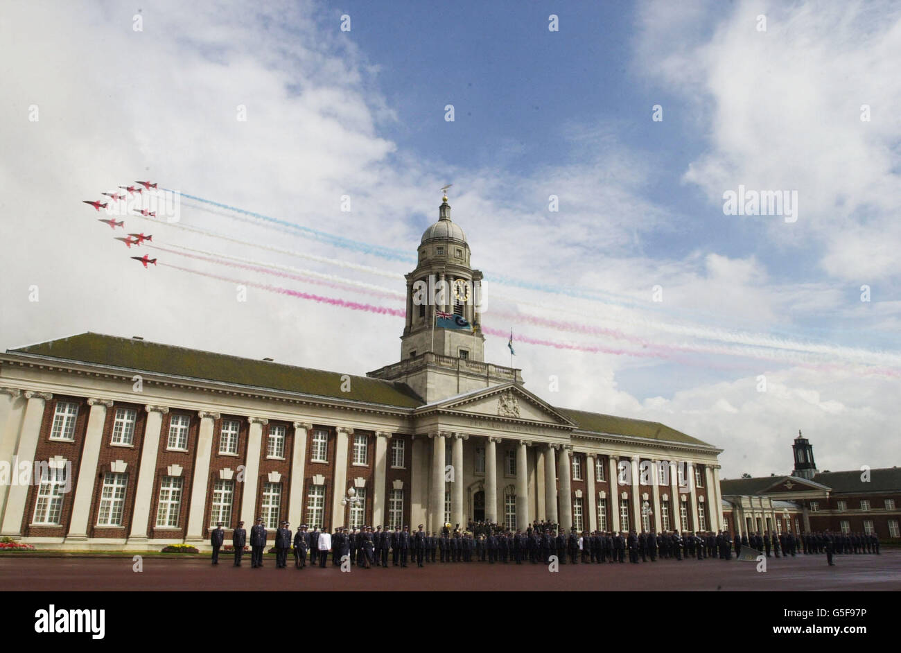 The Red Arrows fly by, during The Prince of Wales visit to RAF College ...