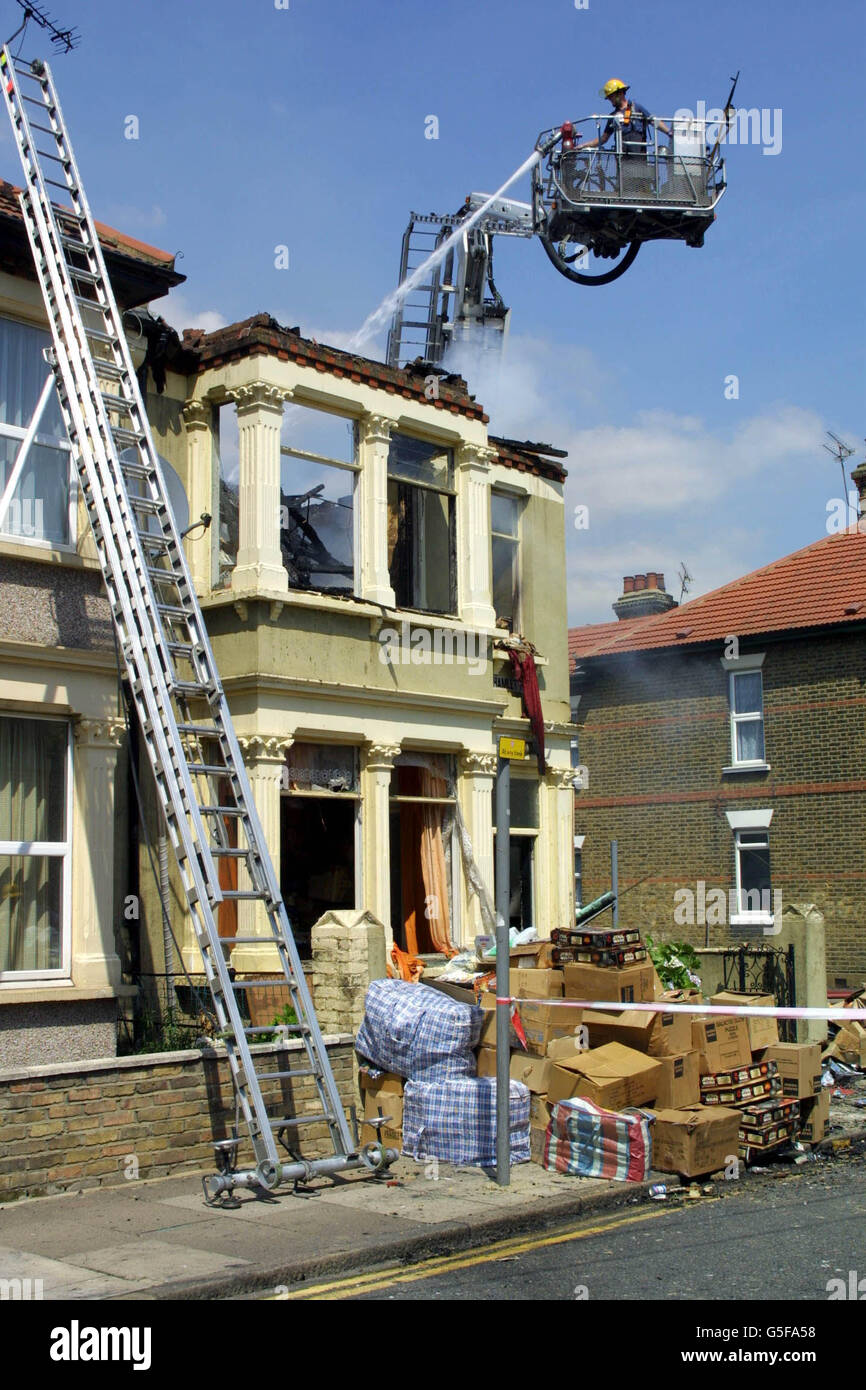 Firefighters from Southend and Canvey Fire Brigade dampen down the ...