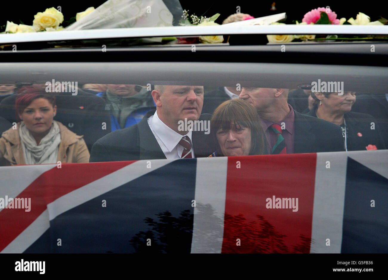 Family and friends of Private Thomas Wroe during the repatriation in ...