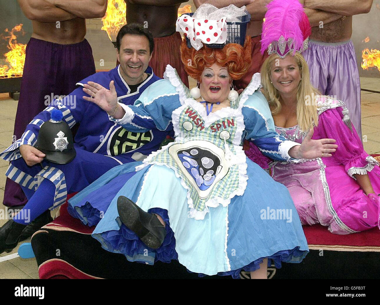 From left - Russ Kane as the Police Chief, John Inman as the Widow ...