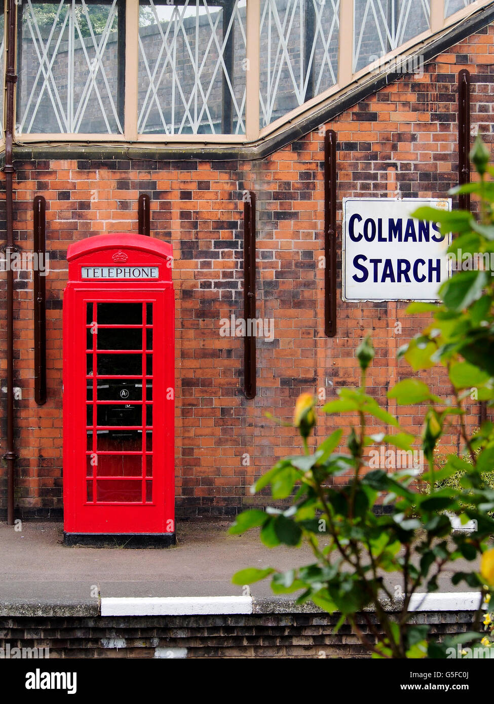 A K6, the most common type of red telephone box in a period setting on ...