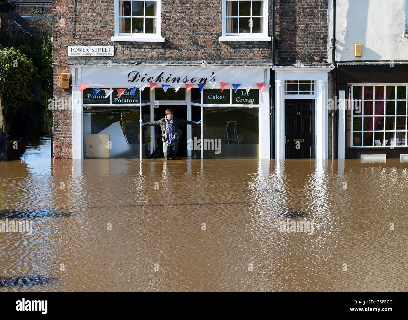 Flooded city centre shops in York. The River Ouse has now peaked only ...