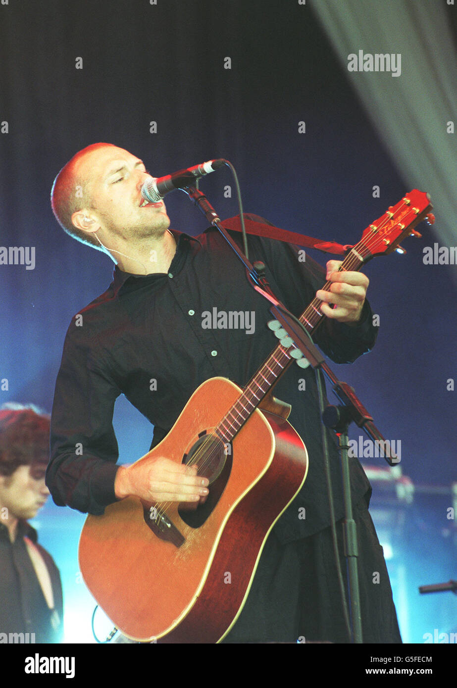 Lead singer of pop group coldplay hi-res stock photography and images ...