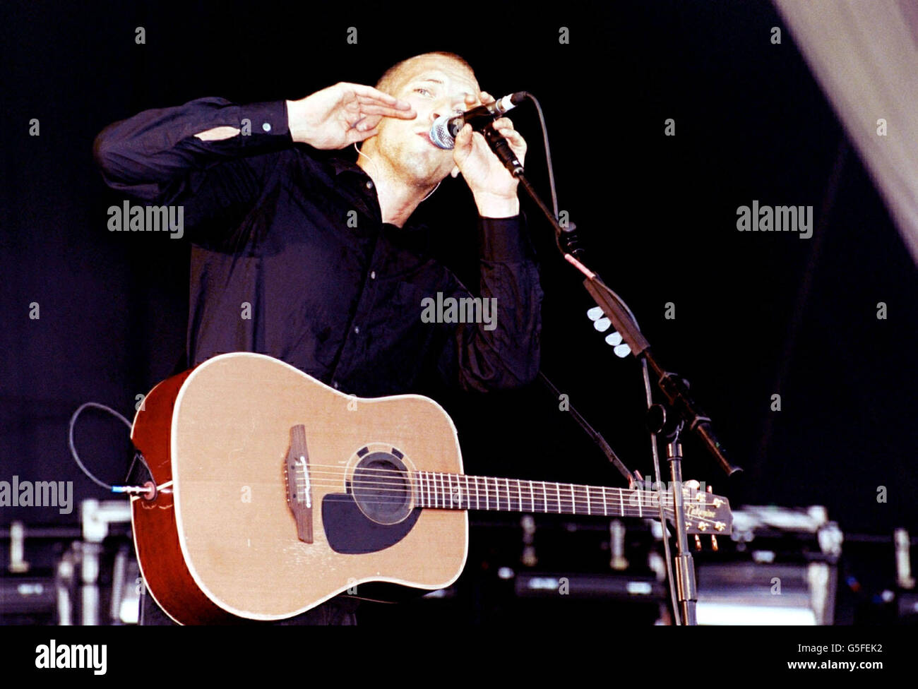 Lead singer of pop group coldplay hi-res stock photography and images ...