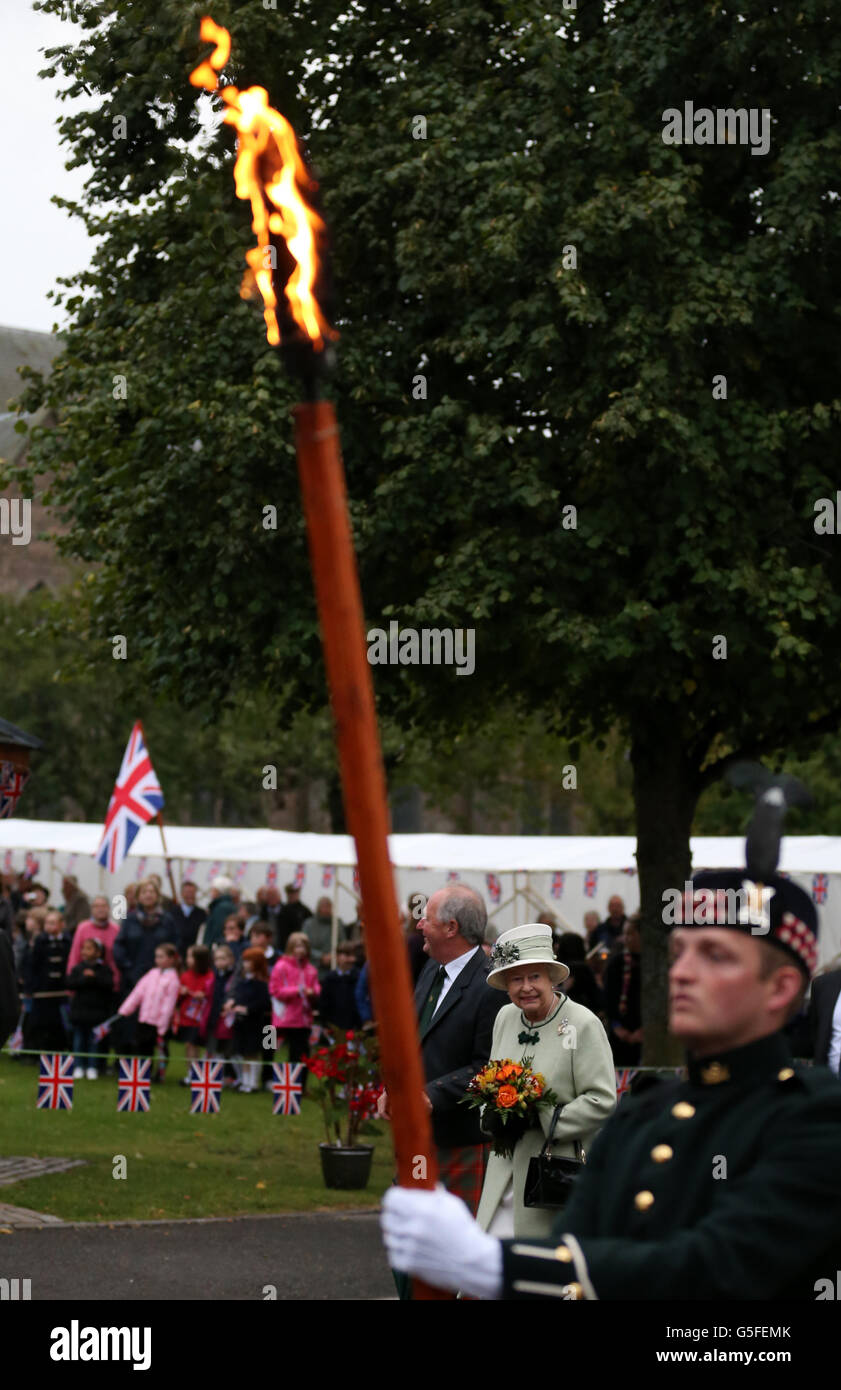 Queen Elizabeth II, walks with Gordon Bruce, in Ballater, Aberdeenshire ...