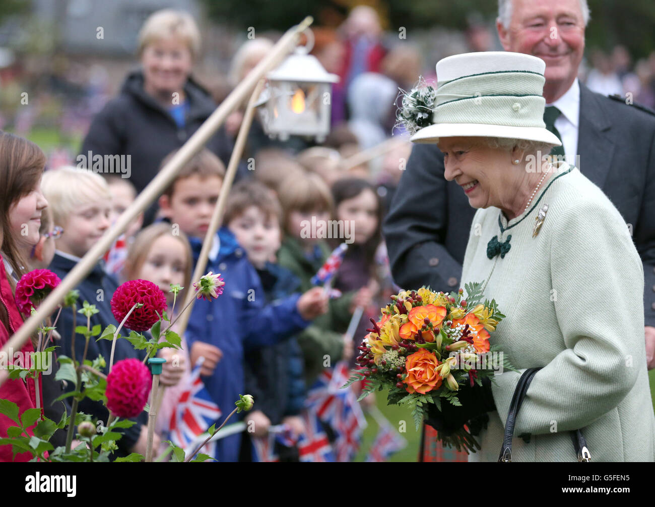 Queen Elizabeth II, talks to local children, in Ballater, Aberdeenshire ...